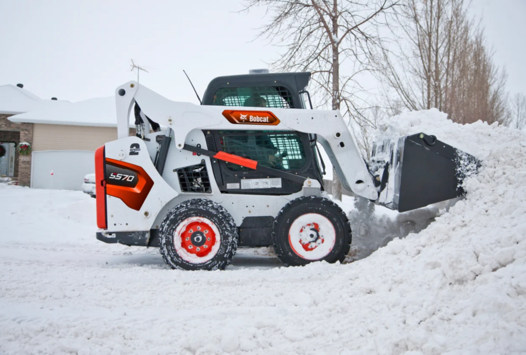 Reserve a Bobcat S570 Wheeled Skid Loader (With Bucket or Forks)