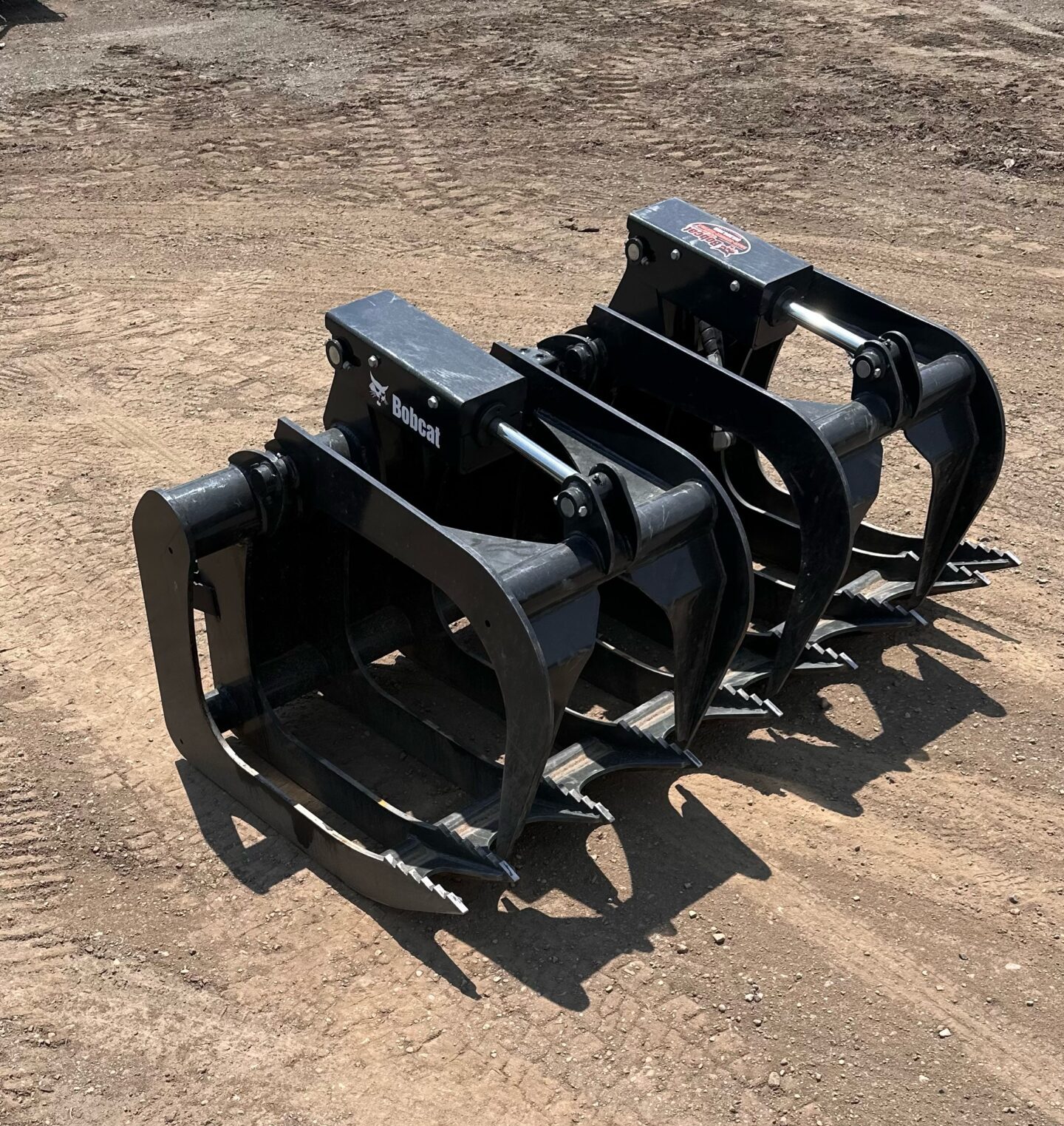 Rent a Skid Loader Root Grapple Attachment 66" at Ward's Rental